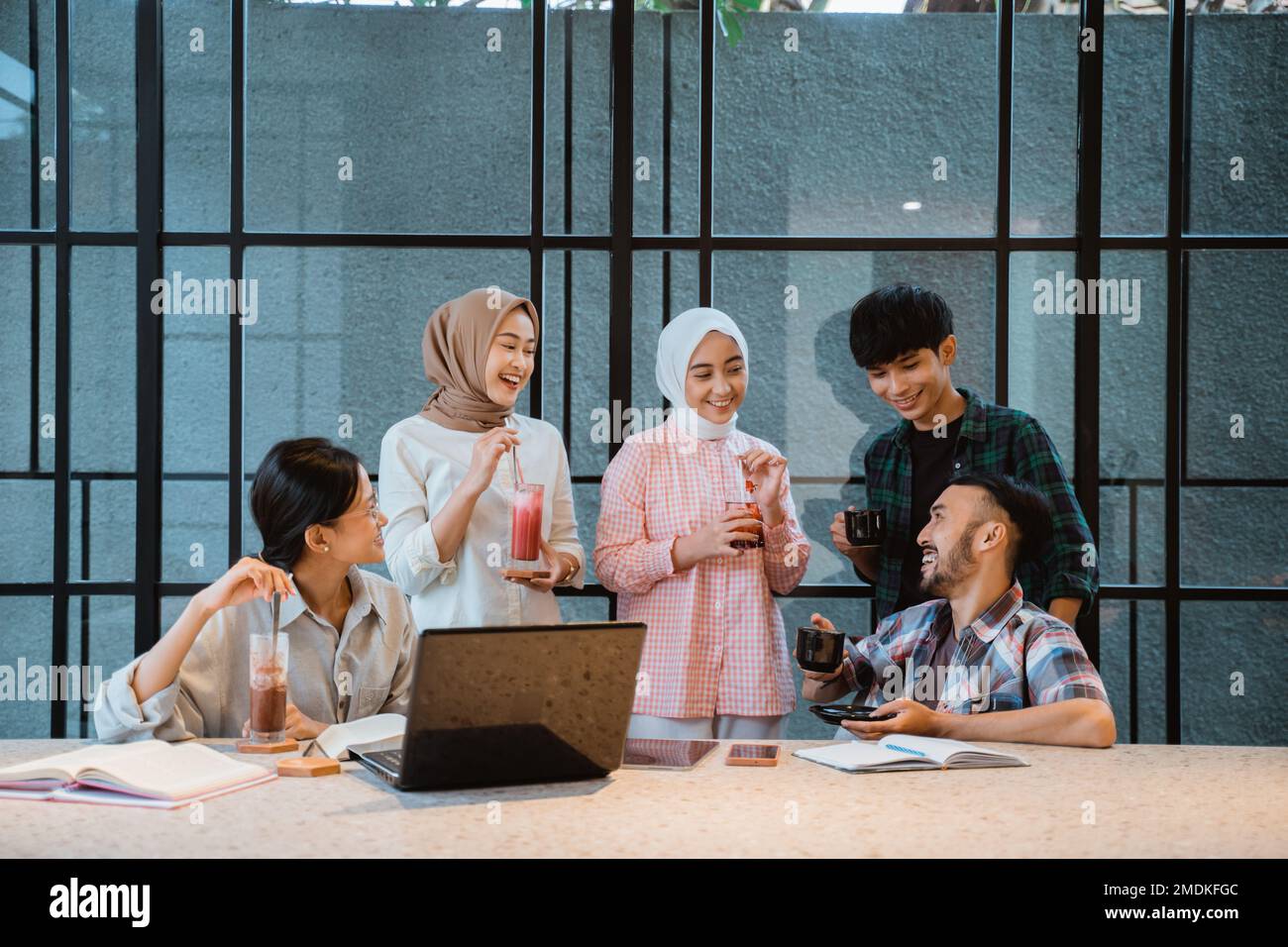 a group of young asian people enjoying chatting Stock Photo - Alamy