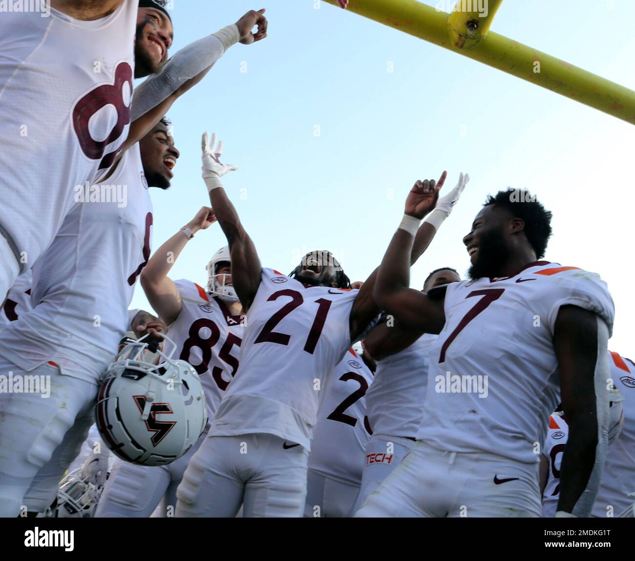 Members of the Virginia Tech football team celebrate after their win ...