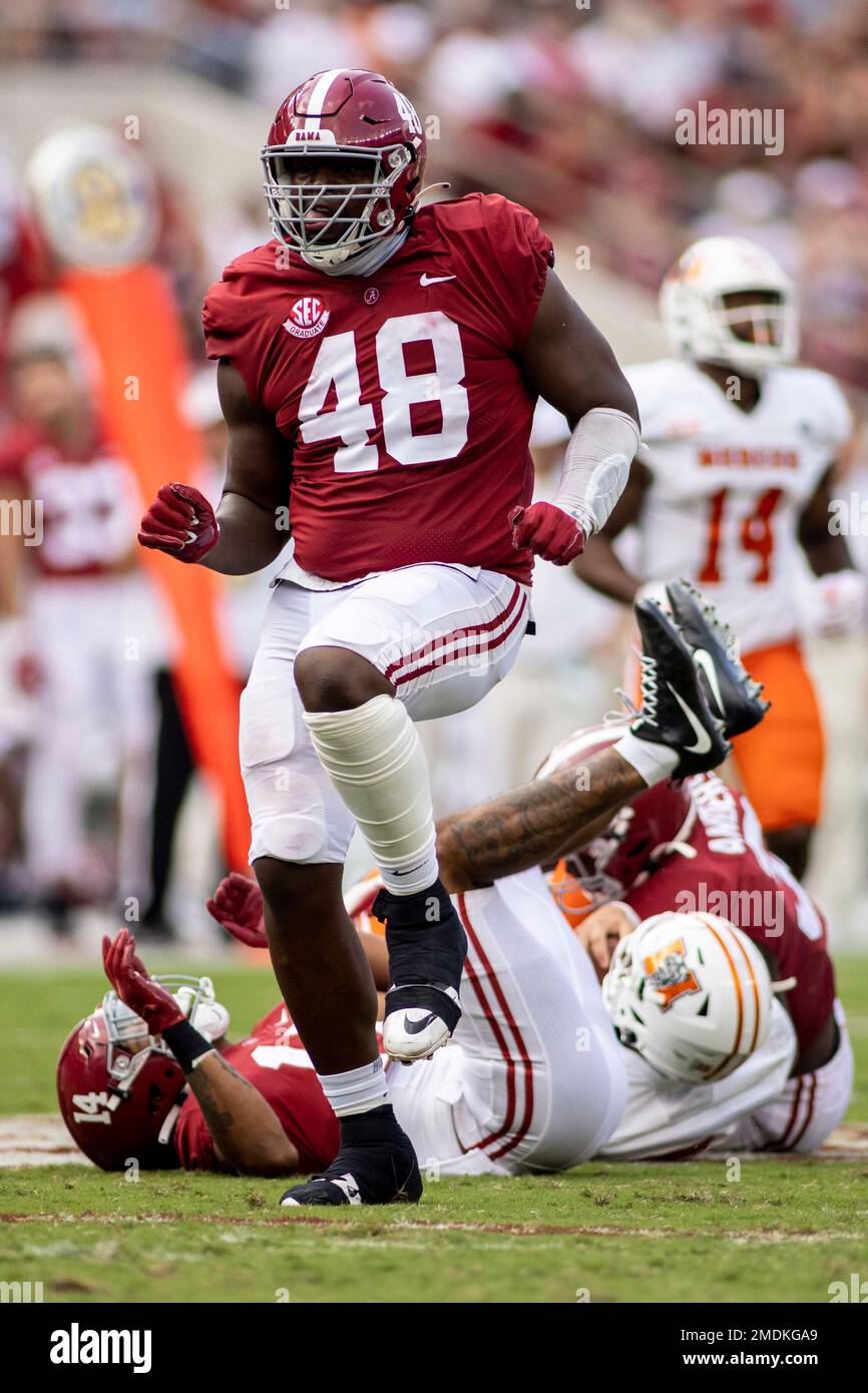 Alabama defensive lineman Phidarian Mathis (48) does a sack-dance ...