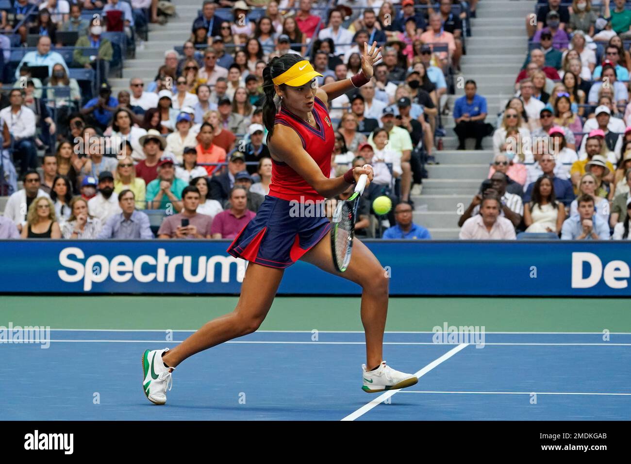 Emma Raducanu, of Britain, returns a shot to Leylah Fernandez, of ...
