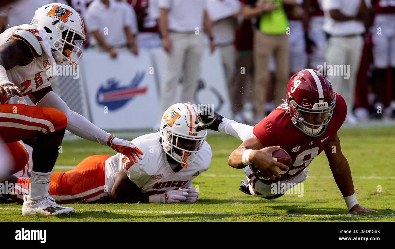 Alabama quarterback Bryce Young (9) dives for one more yard against ...