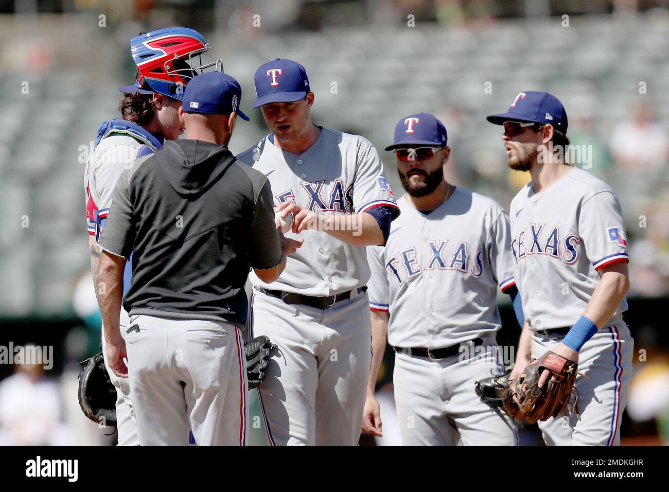Texas Rangers' starting pitcher Wes Benjamin (63) is removed from a ...