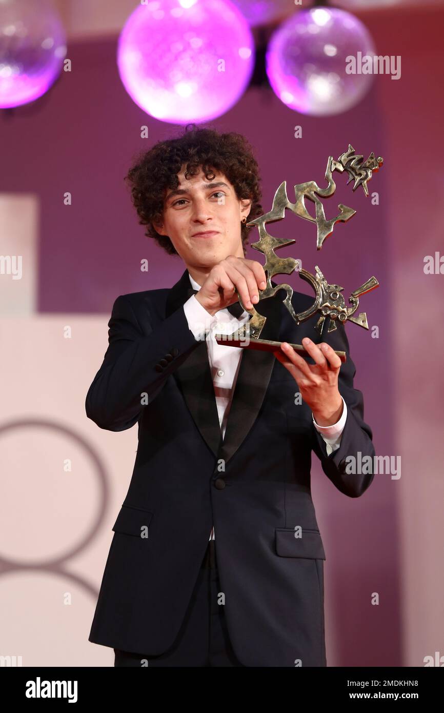 Filippo Scotti holds the award for Best Young Actor for 'The Hand Of ...