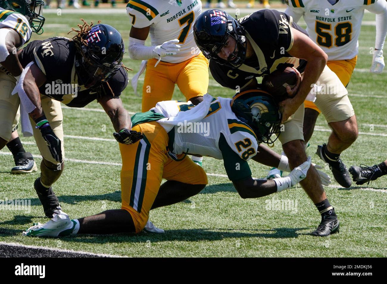 Wake Forest quarterback Sam Hartman scores pass Norfolk State defensive ...
