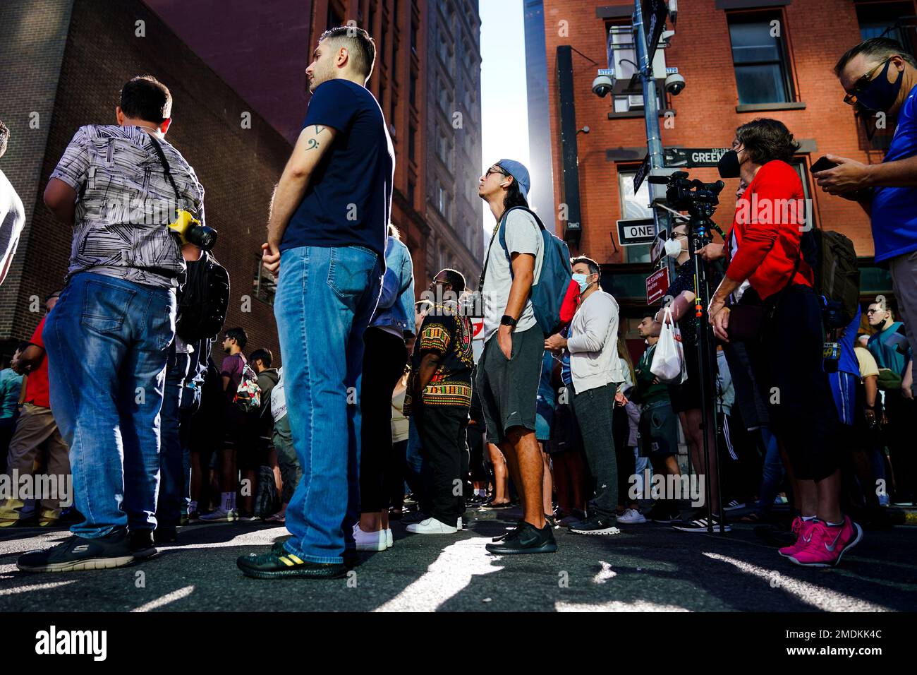 People gather outside the National September 11 Memorial and Museum ...