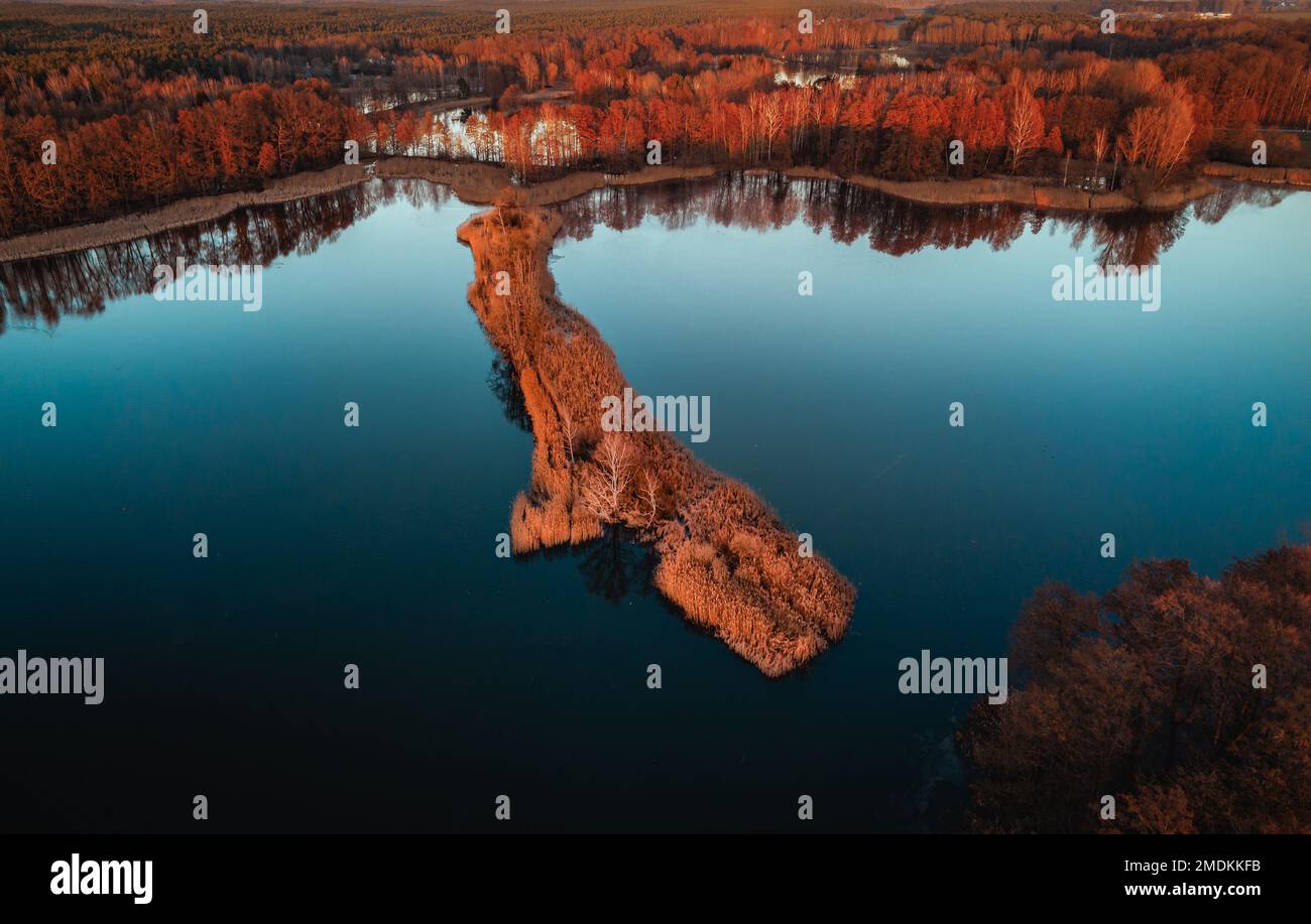 Small island fall foliage reflecting hi-res stock photography and ...