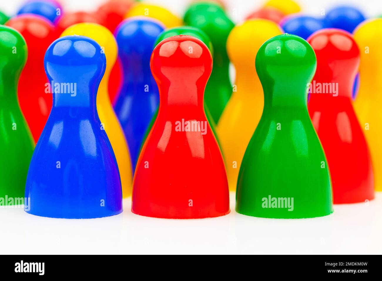 colourful tokens, together in harmony Stock Photo - Alamy