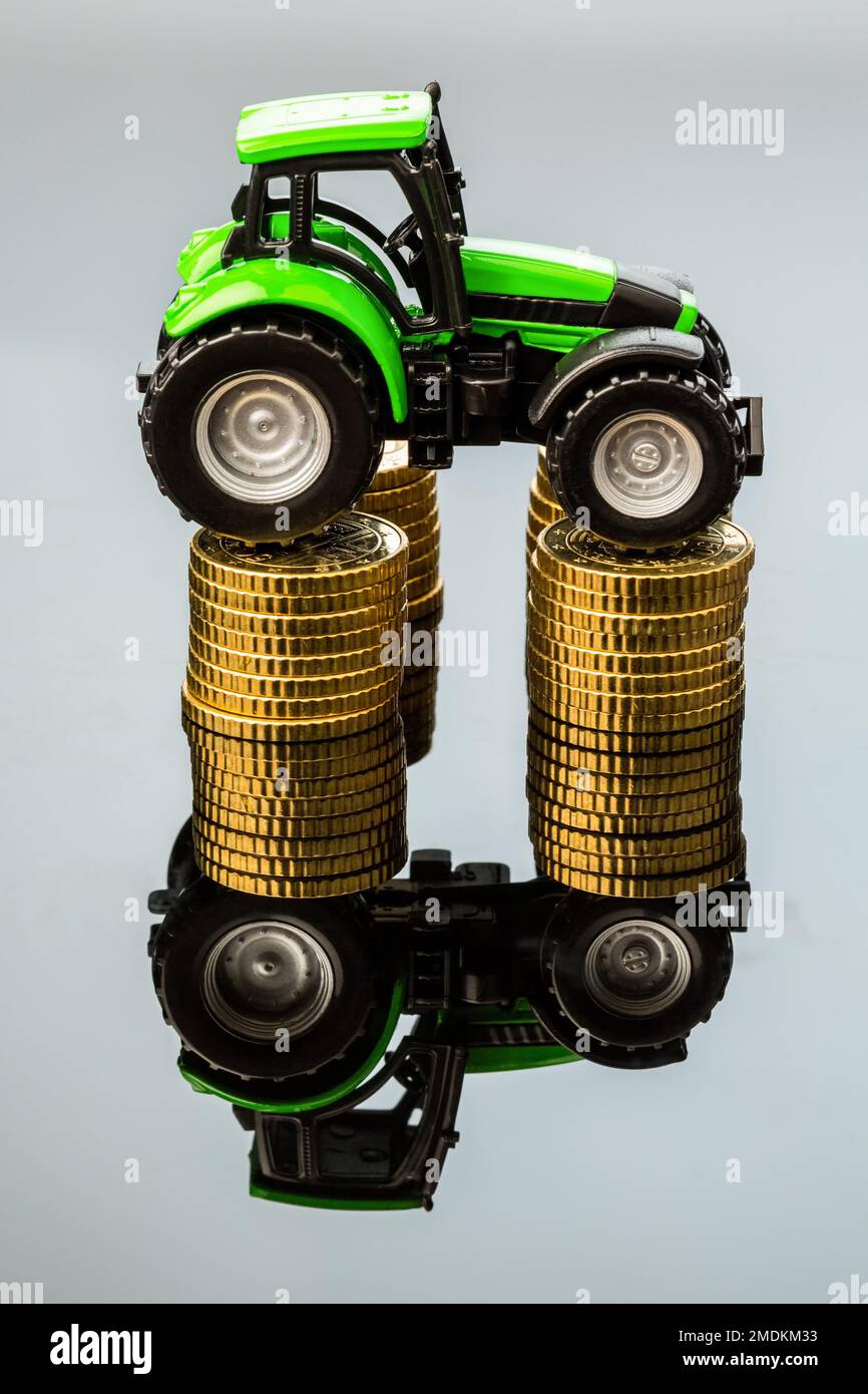 excavator on coin piles, increasing costs in agriculture sector ...