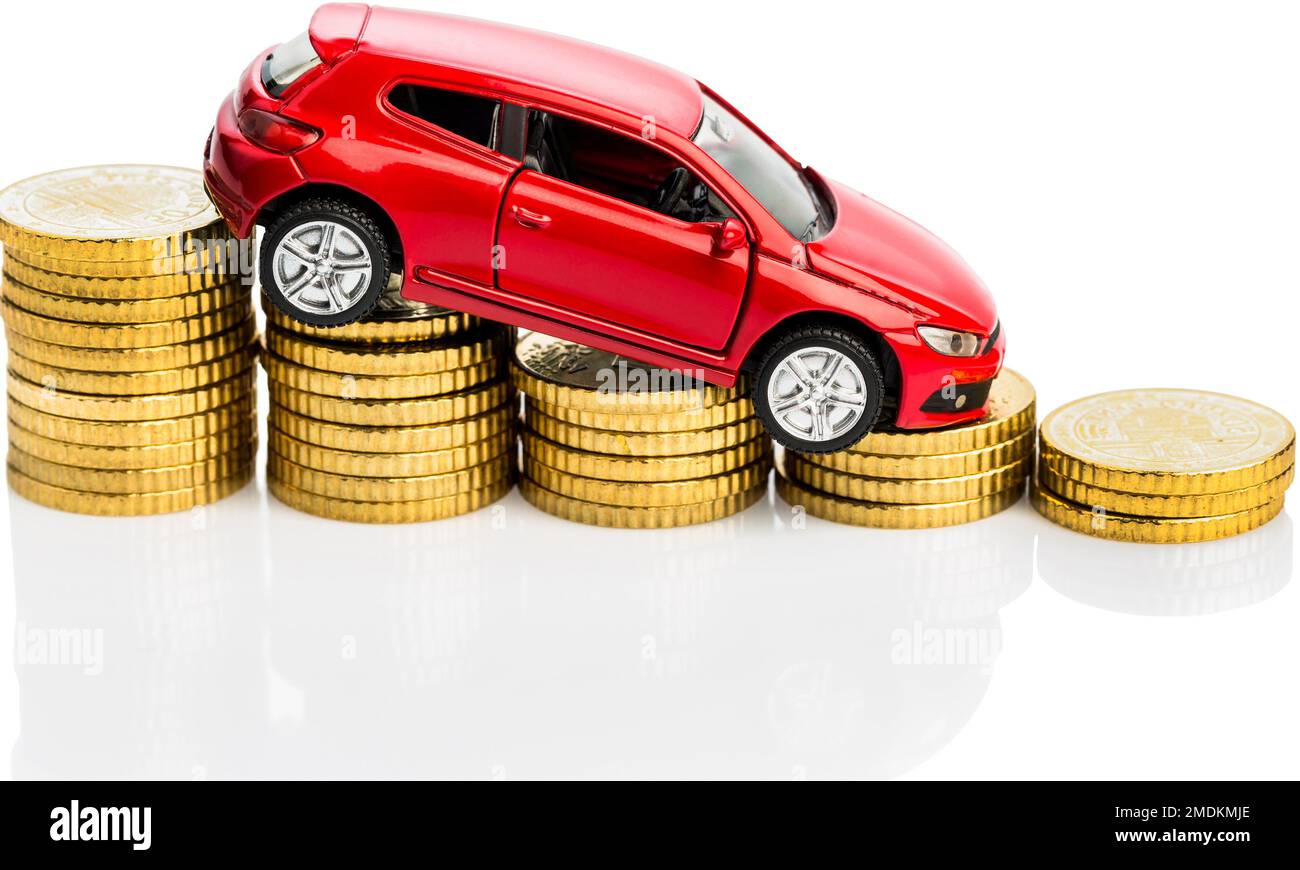 car on coin piles, decreasing profits in car sale, composing Stock ...
