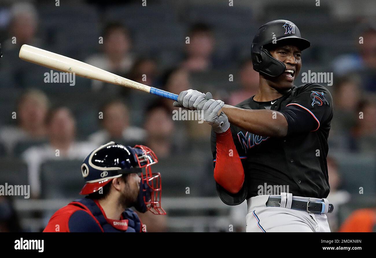Miami Marlins' Jesus Sanchez swings against the Atlanta Braves in the ...