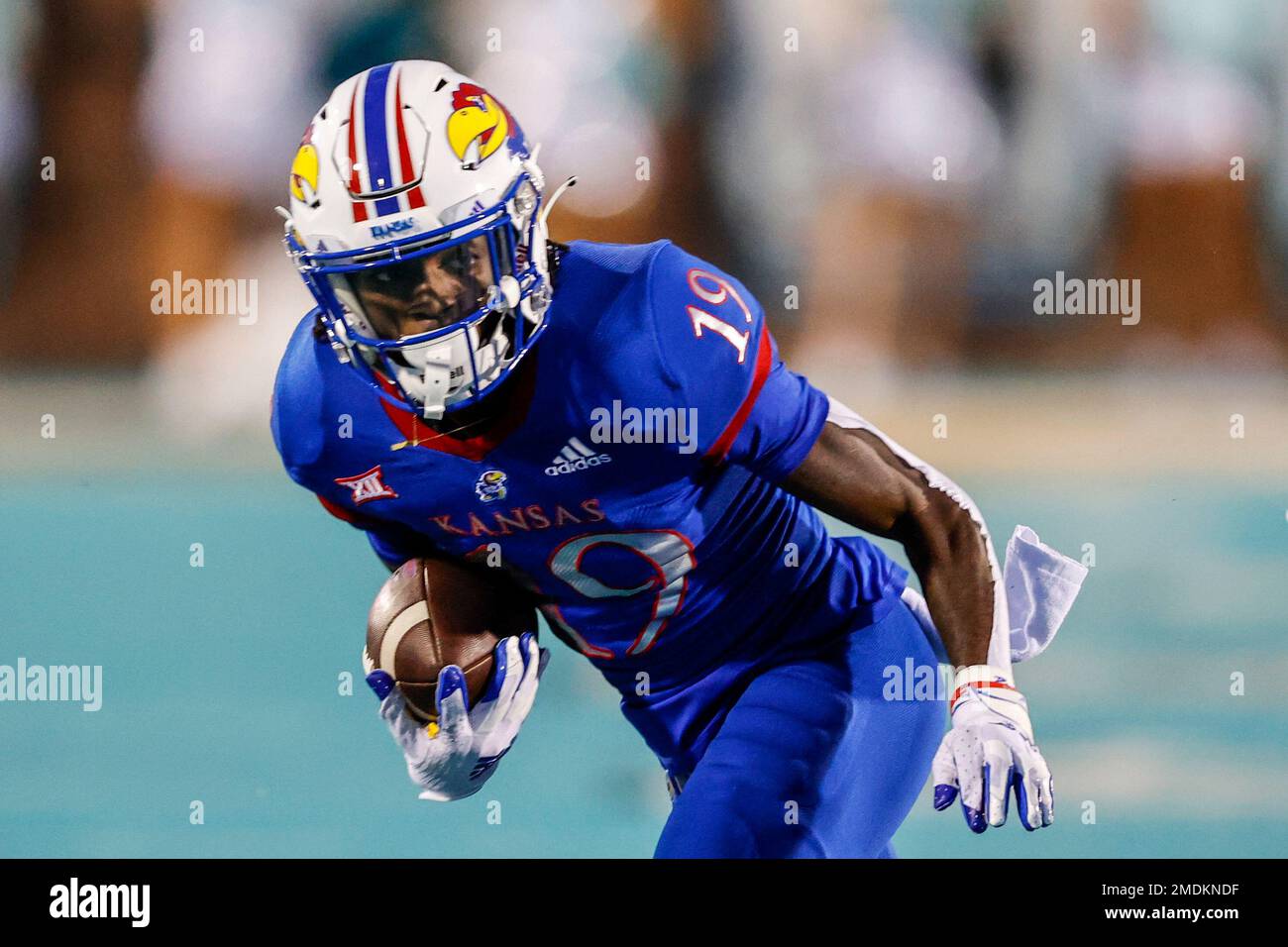 Kansas wide receiver Steven McBride runs after a catch against Coastal ...