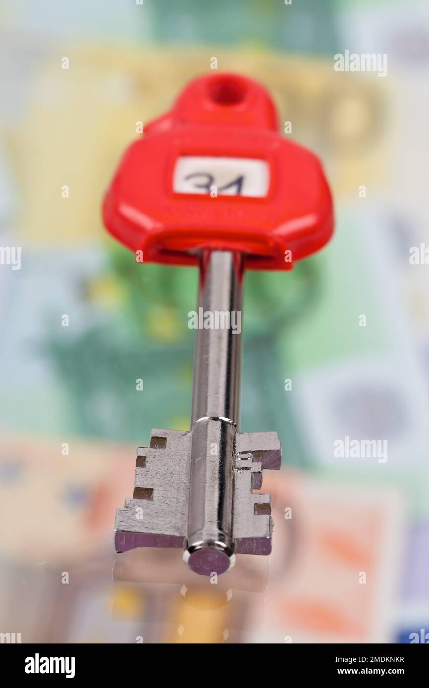 key of a safe with the number 31 on Euro bills, cutout Stock Photo - Alamy
