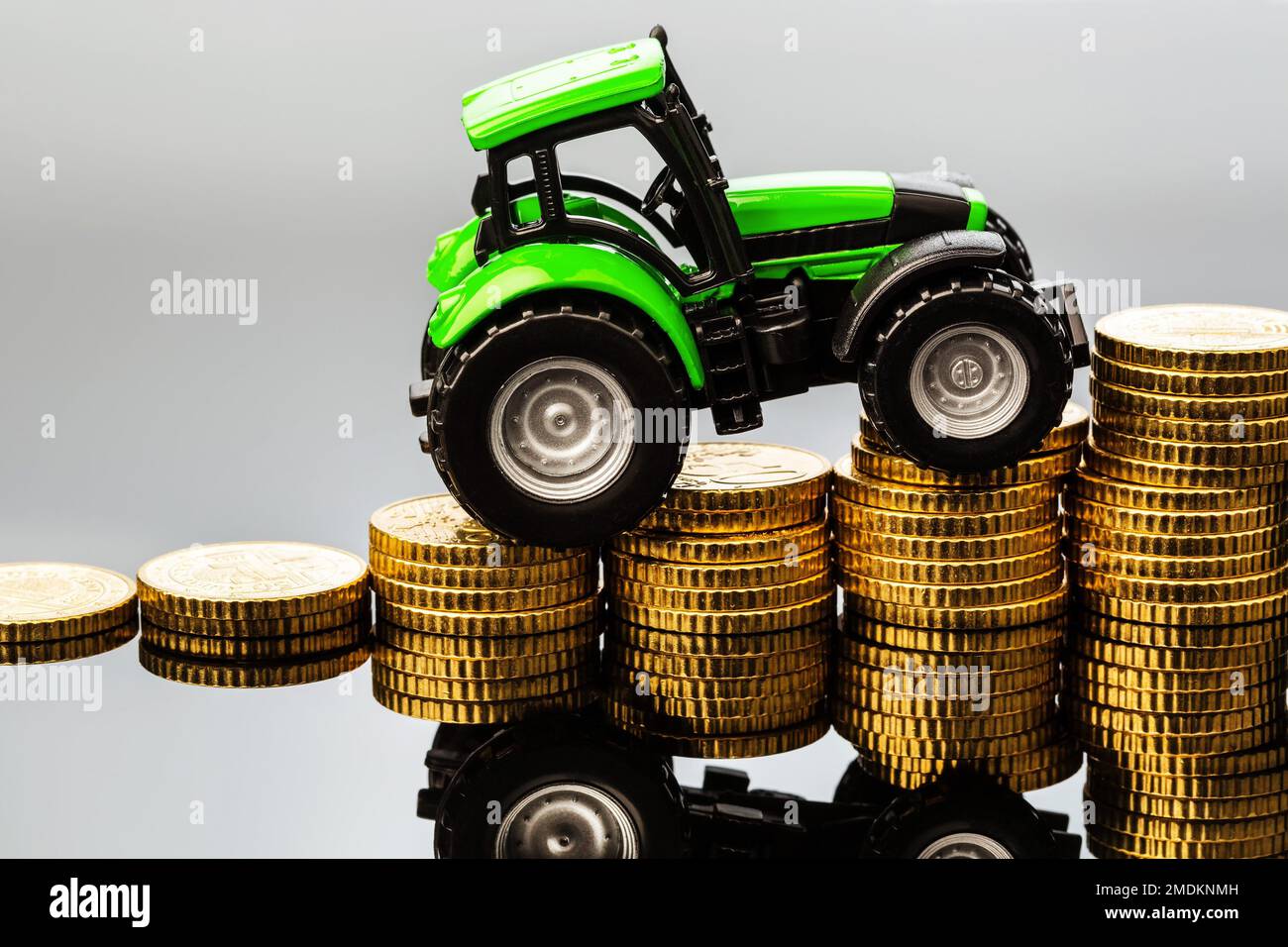 excavator on coin piles, increasing costs in agriculture sector ...