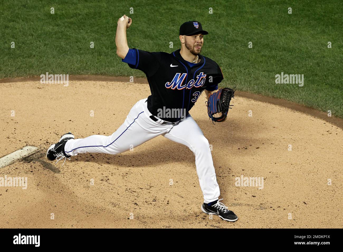 New York Mets pitcher Tylor Megill delivers to the New York Yankees ...
