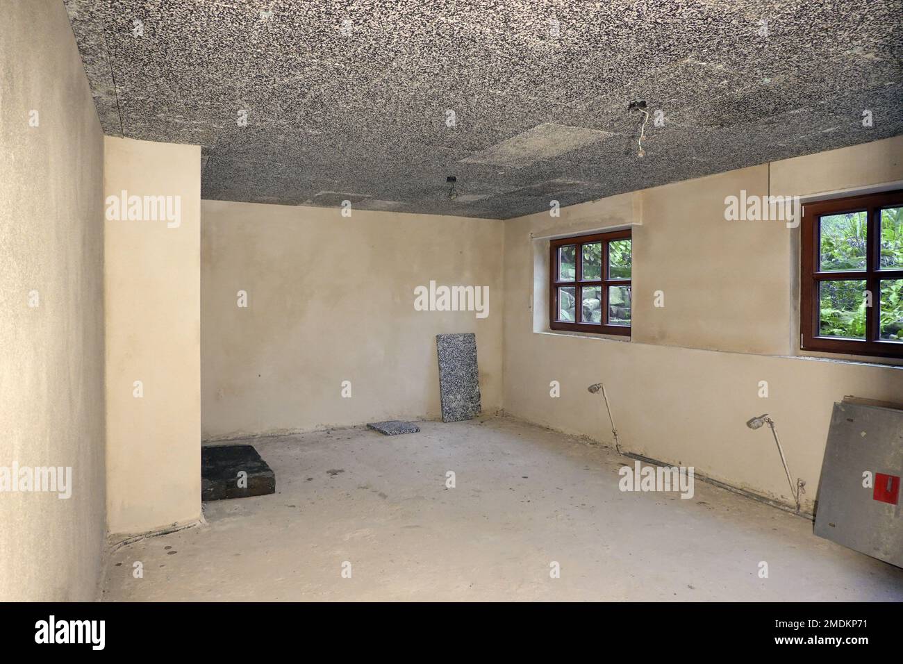 renovation of a basement after flooding with new plaster and ceiling ...