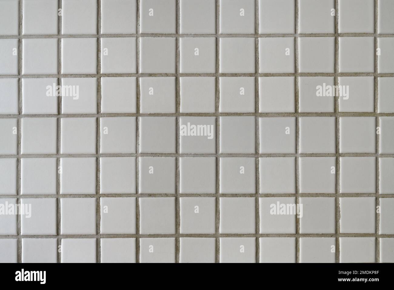 Small white ceramic tiles pattern as background Stock Photo - Alamy