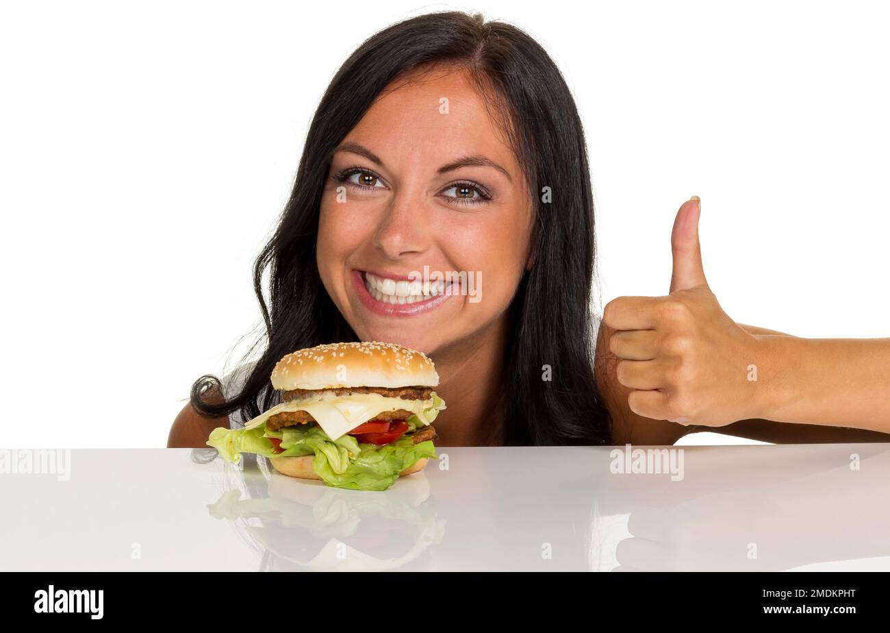 Woman eating hamburger horizontal hi-res stock photography and images ...