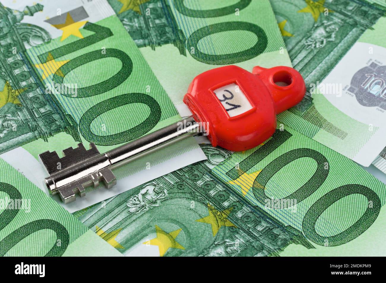 key of a safe with the number 31 on Euro bills, cutout Stock Photo - Alamy