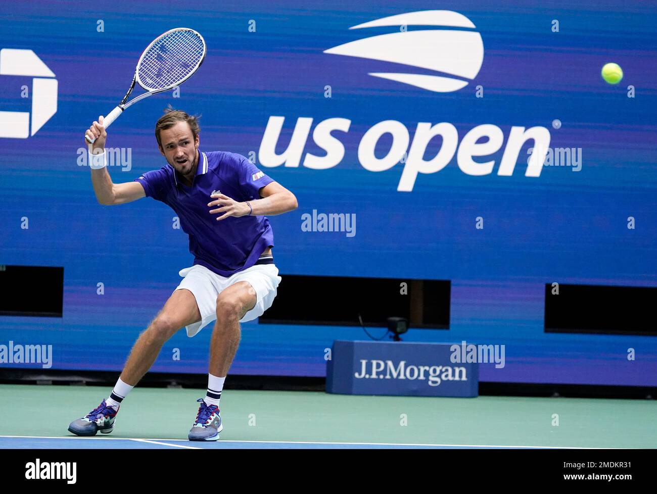 Daniil Medvedev, of Russia, returns a shot to Felix Auger-Aliassime, of Canada, during the ...