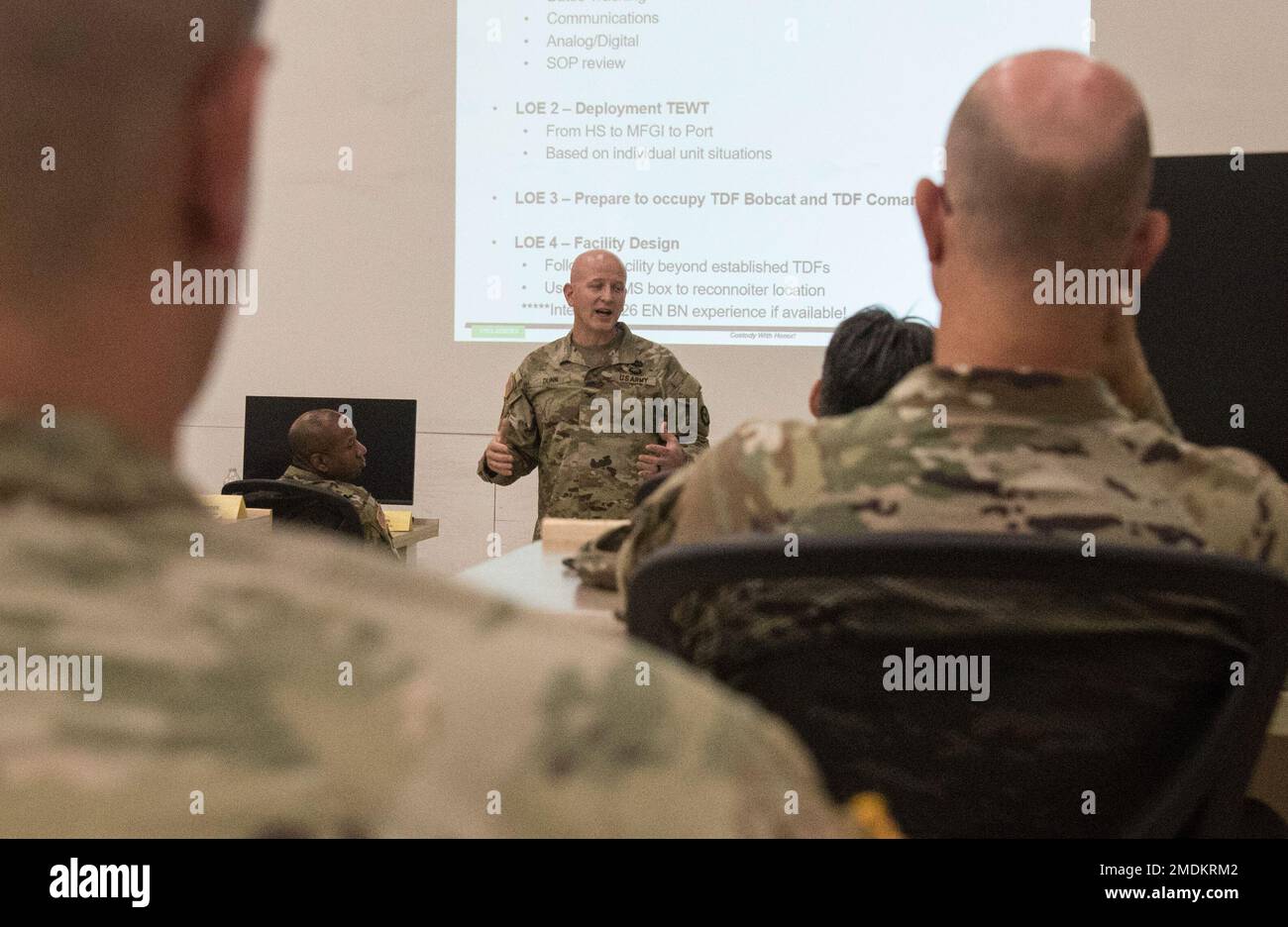 Col. John Dunn, commander of the 290th Military Police Brigade, speaks ...