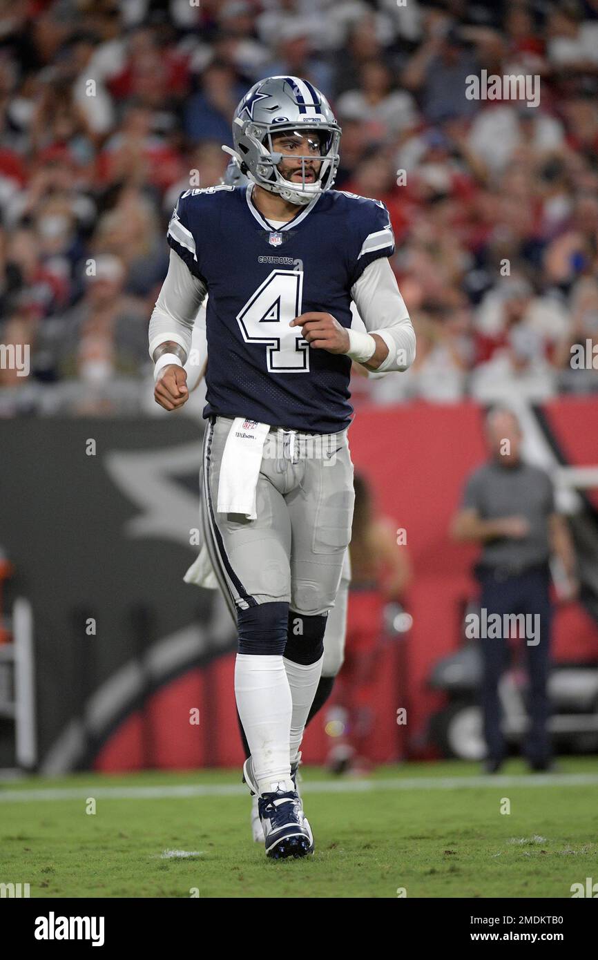 Dallas Cowboys quarterback Dak Prescott (4) sets up for a play during ...