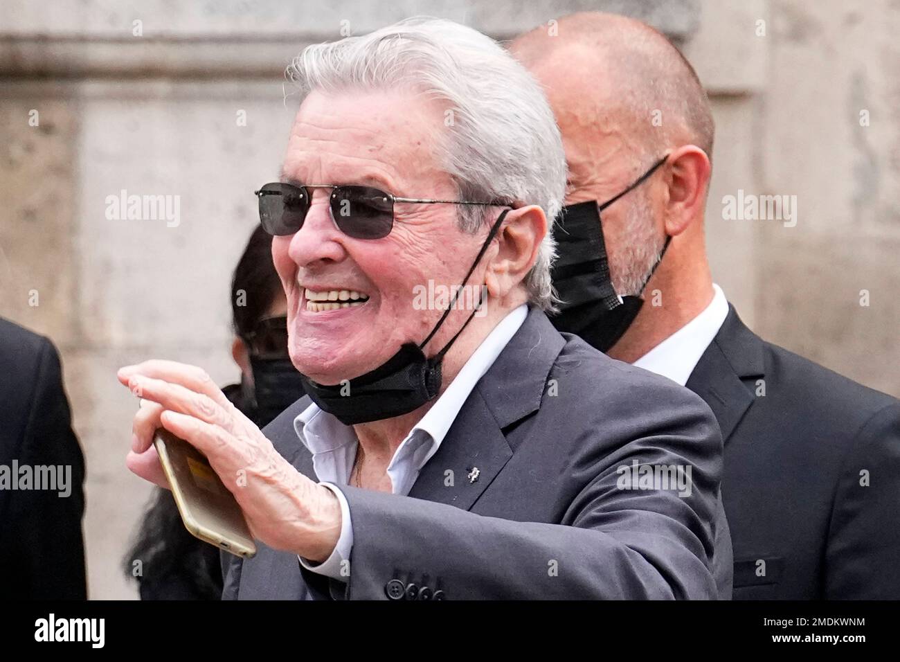 French actor Alain Delon gestures as he arrives at the Saint Germain ...