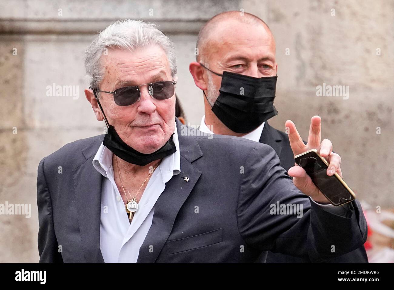 French actor Alain Delon gestures as he arrives at the Saint Germain ...