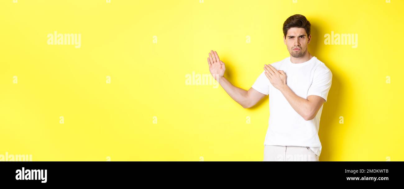 Man showing kung-fu skills, martial arts ninja movement, standing in ...