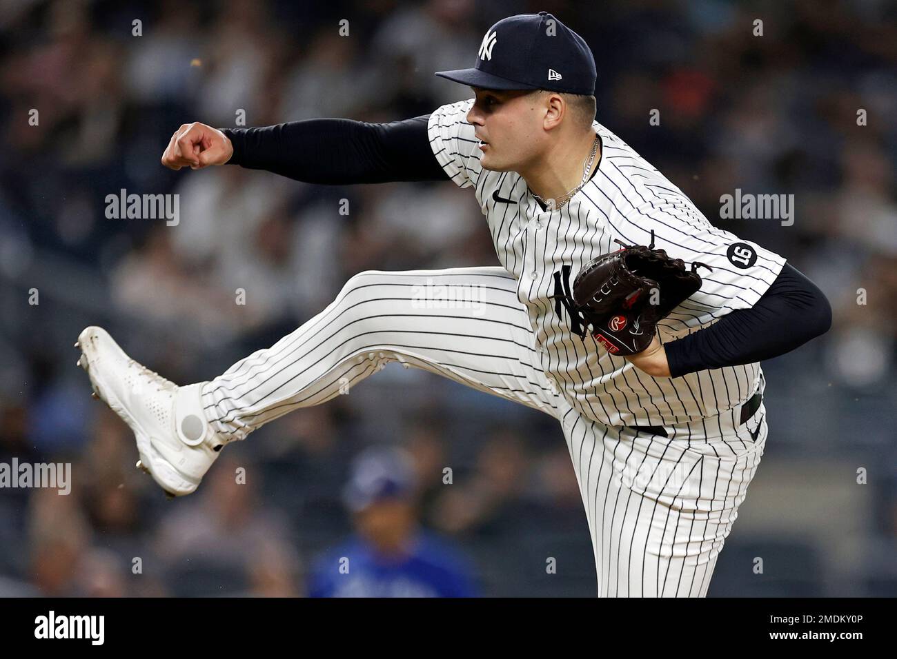 New York Yankees pitcher Sal Romano delivers a pitch to the Toronto ...