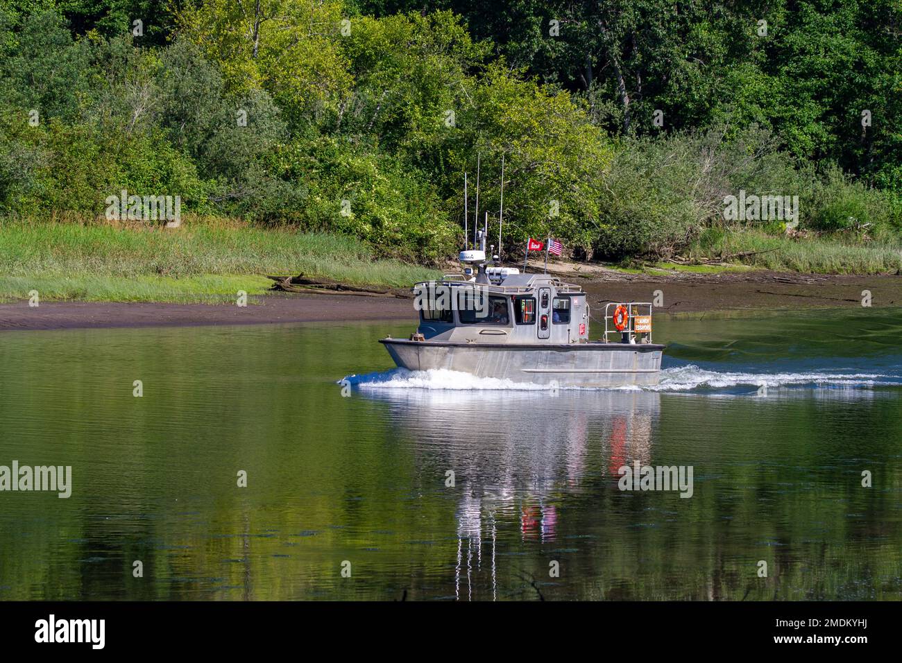 Launch boat of the hopper dredge, Essayons, escorts command group to ...