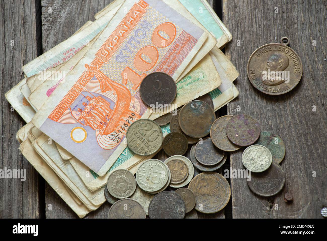 monetary unit of the Ukrainian state coupon and coins of the ussr lie ...