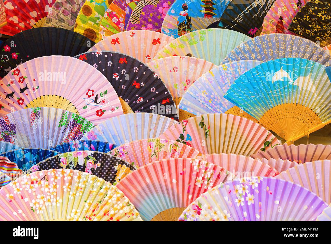 Traditional Geisha style hand held fans on display for tourists Stock ...