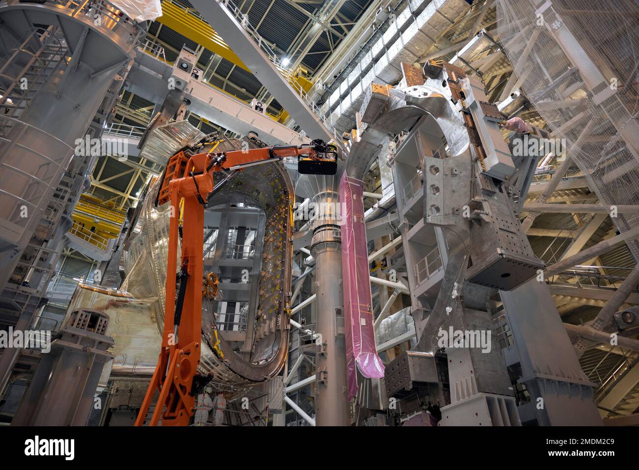 The heat blanket, left, and vacuum vessel components of the ITER ...