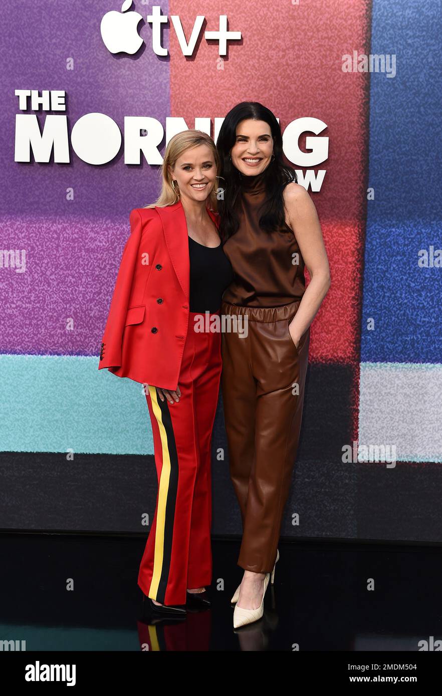 Cast members Reese Witherspoon, left, and Julianna Margulies arrive at ...