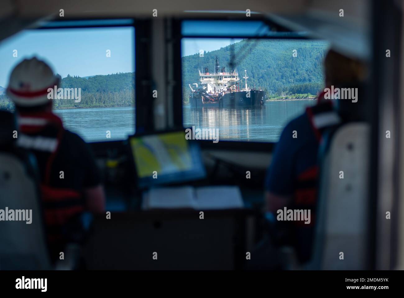 Crewmembers with the Essayons, one of two hopper dredges owned and ...
