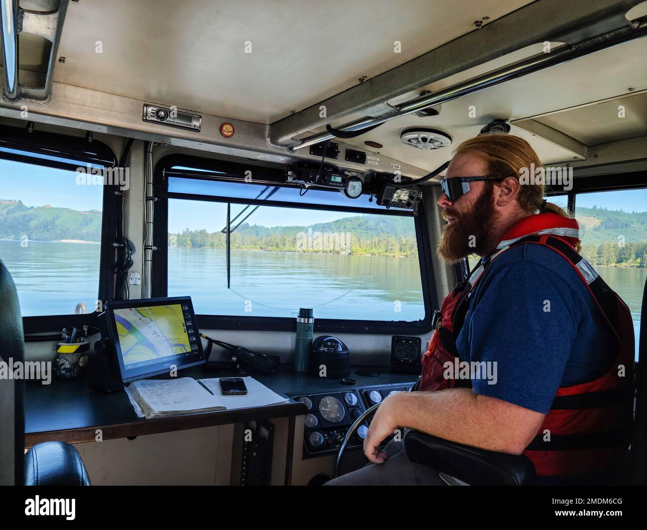 Dredge operator hi-res stock photography and images - Alamy