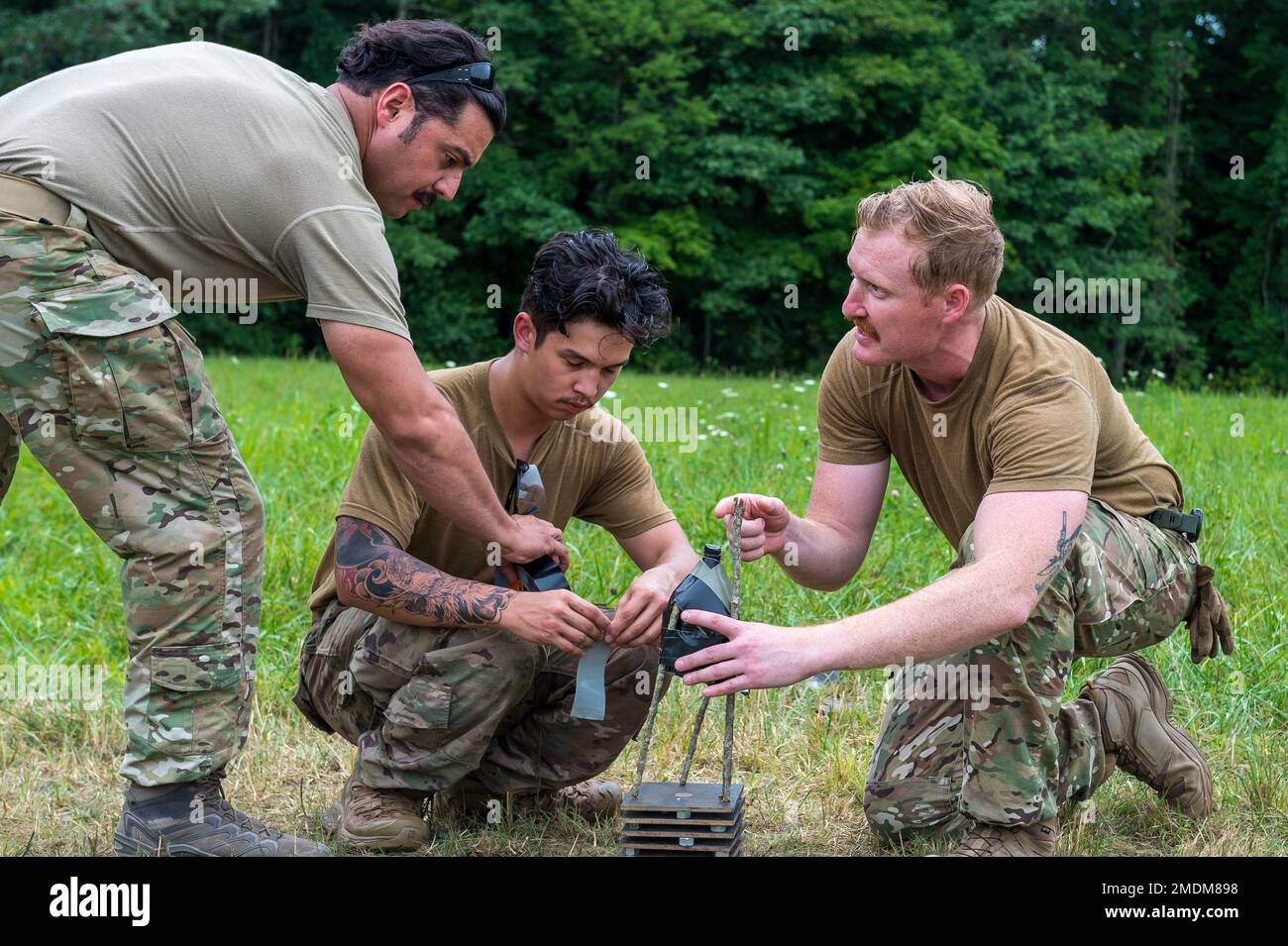 Tech. Sgt. Fernando Aguilera, left to right, and Senior Airmen Benjamin ...