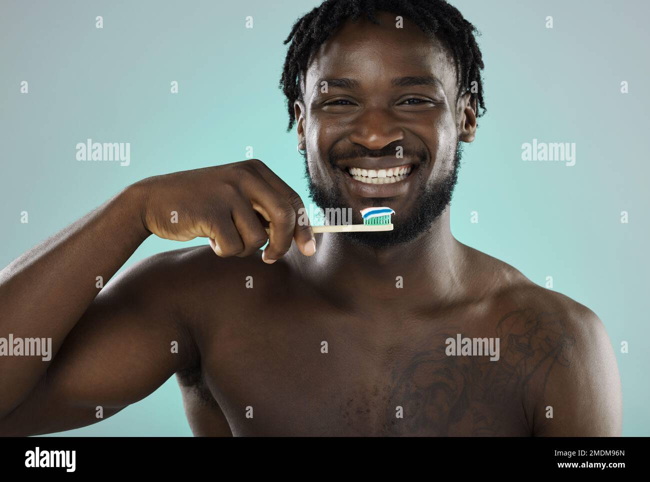 Black man, face and toothbrush with smile in portrait, teeth whitening and cleaning mouth ...