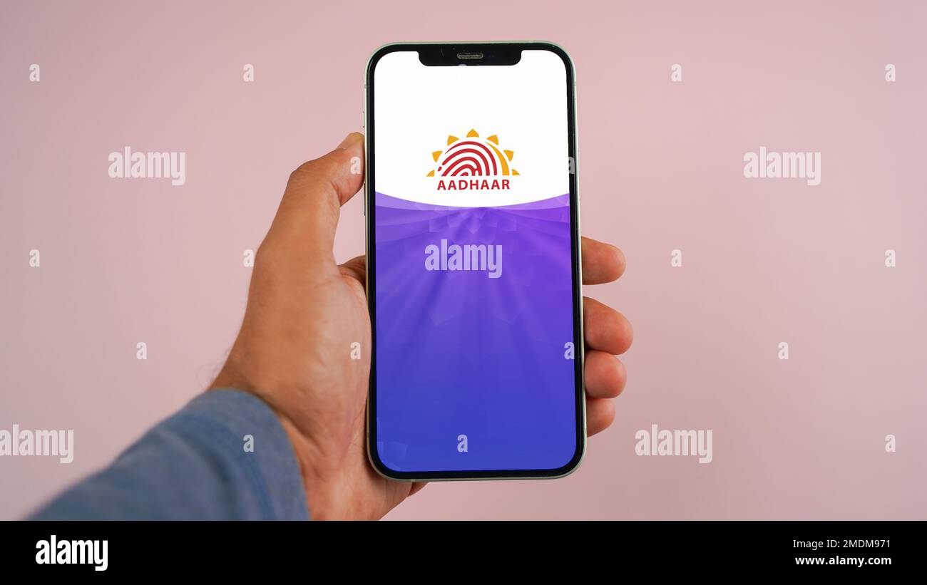 Aadhaar or mAadhaar is a mobile phone app, on the colour background ...