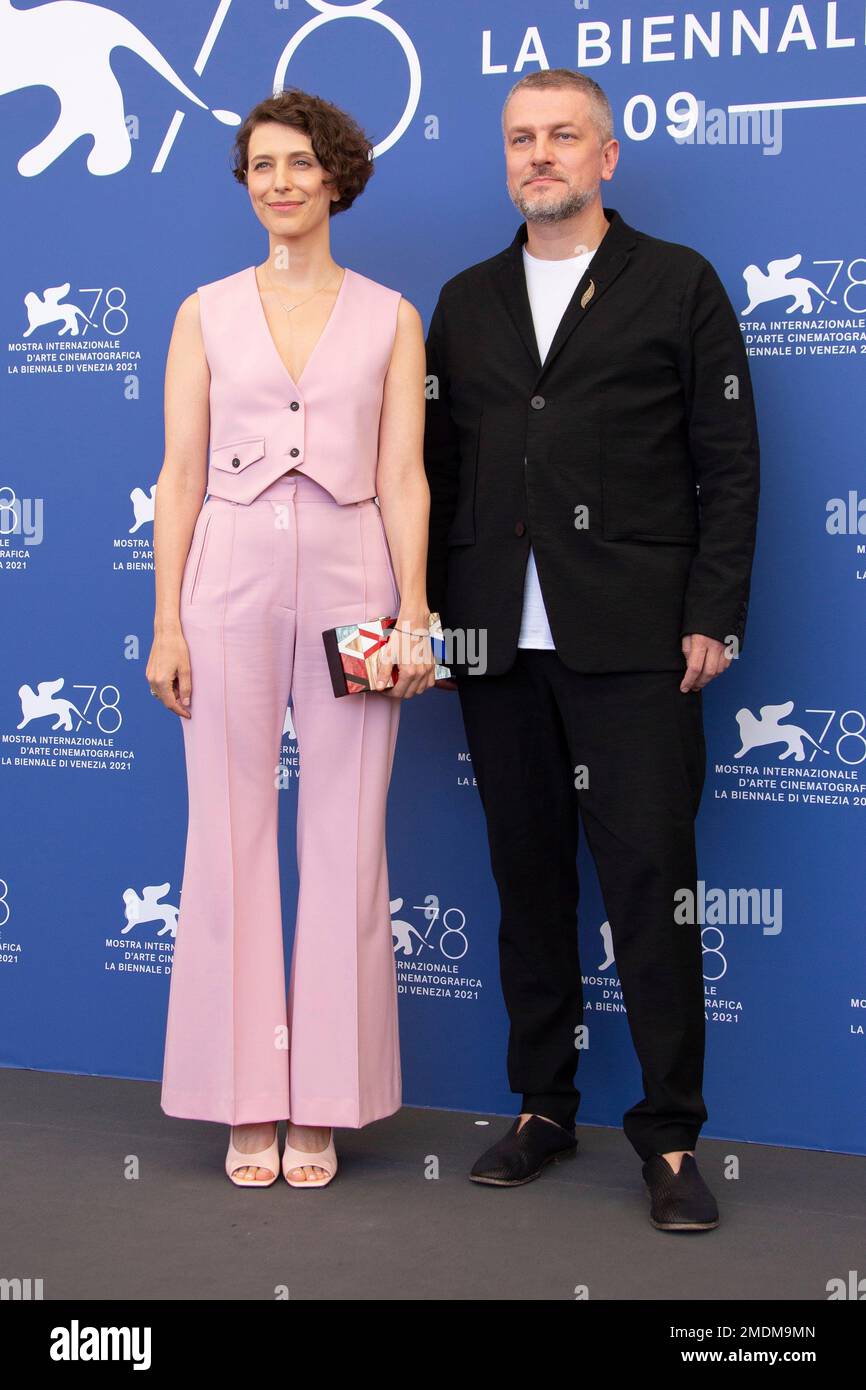 Natasha Merkulova, right, and Aleksey Chupov pose for photographers at ...