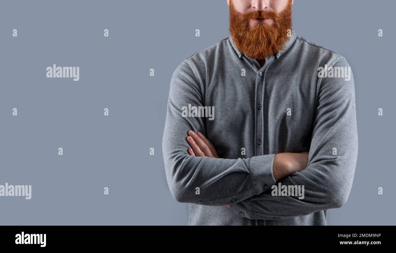 Confident man crop view with long beard. Unshaven face with red beard ...