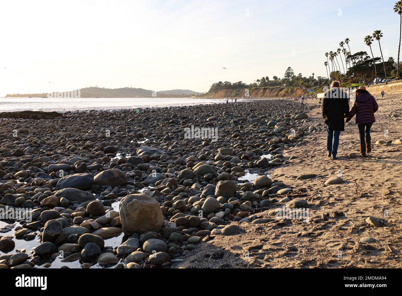 Montecito, California, U.S.A. 22nd Jan, 2023. A couple holds hands on ...