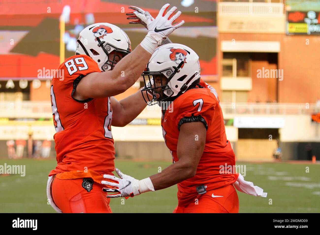 Oklahoma State running back Jaylen Warren (7) celebrates his touchdown ...