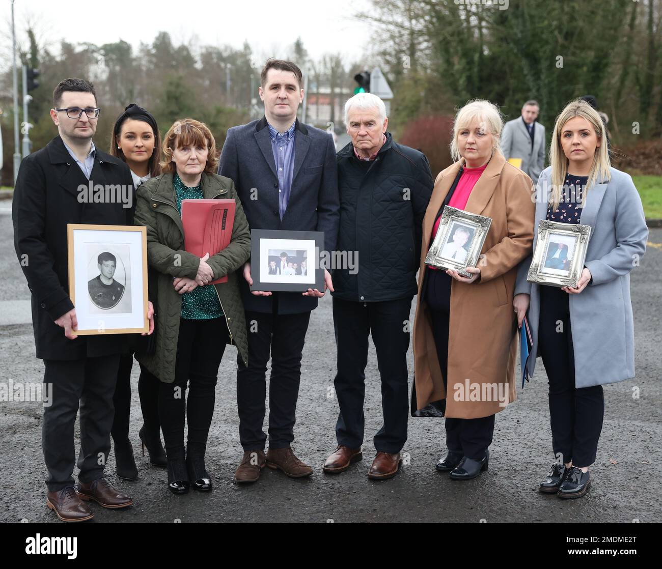 RETRANSMITTING UPDATING CAPTION Bernadette McKearney (third left) widow ...