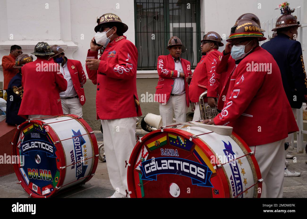 Drummers rest from performing on the National Day of the Morenada Dance ...