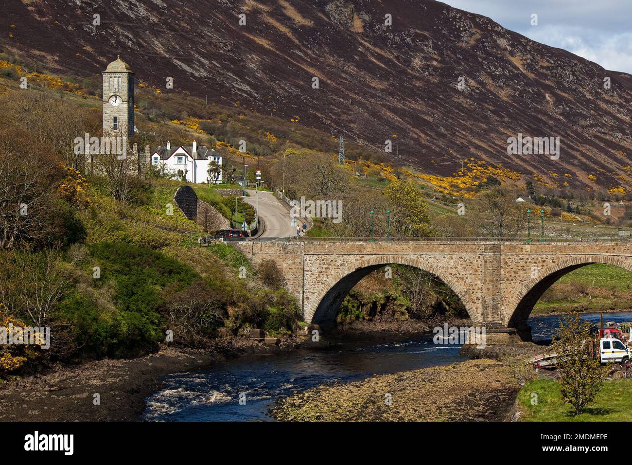 The River Helmsdale, the old bridge and the War Memorial in the Strath ...