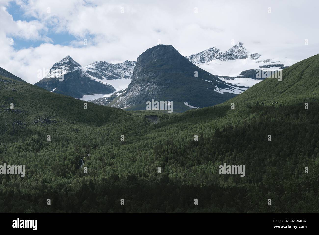 Natural background for design. Tops of mountains in the clouds ...