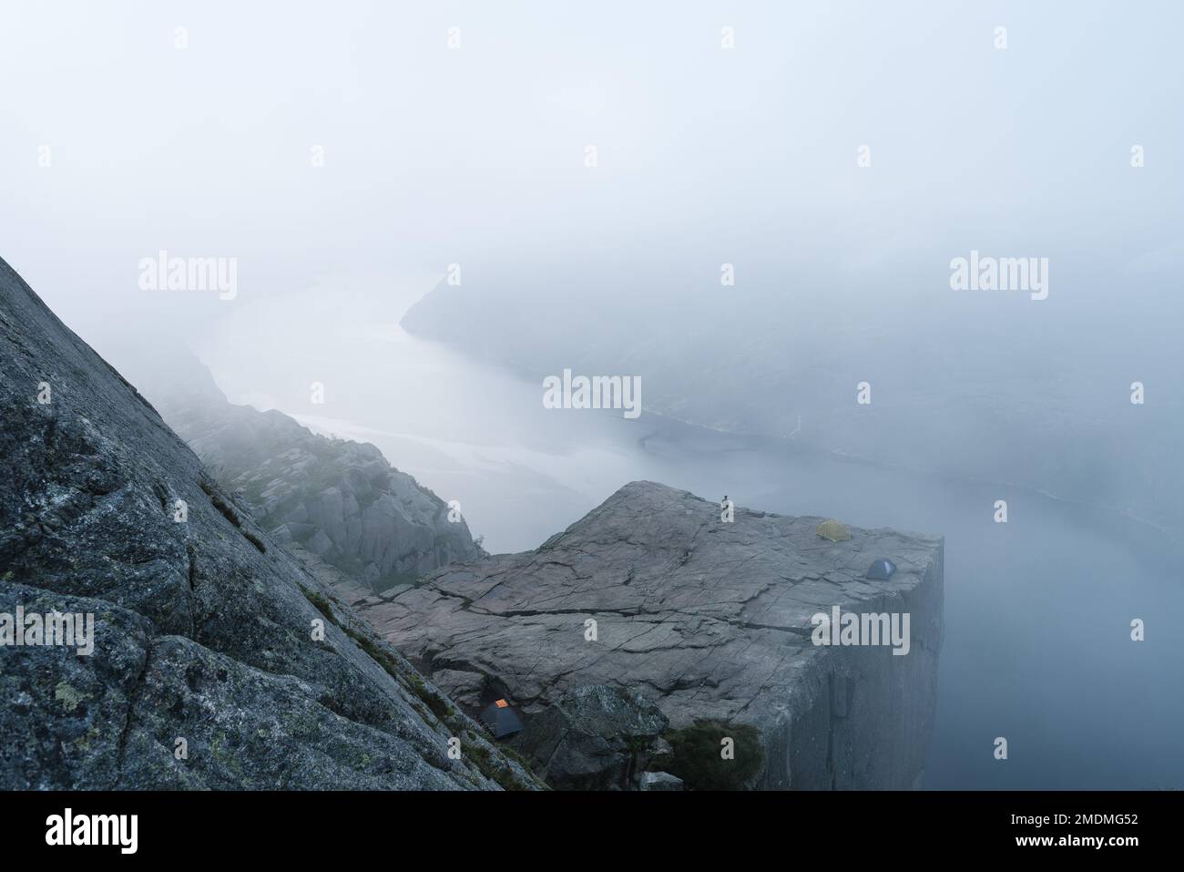 Cliff Preikestolen in fog at Lysefjord fjord, Norway Stock Photo - Alamy