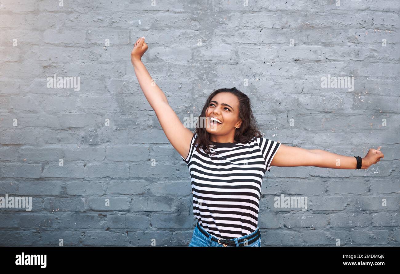 Theres freedom in just being yourself. a young woman standing with her ...