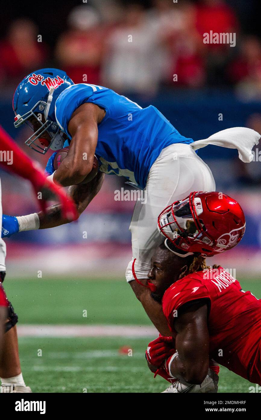 Mississippi running back Jerrion Ealy (9) is tackled by Louisville ...